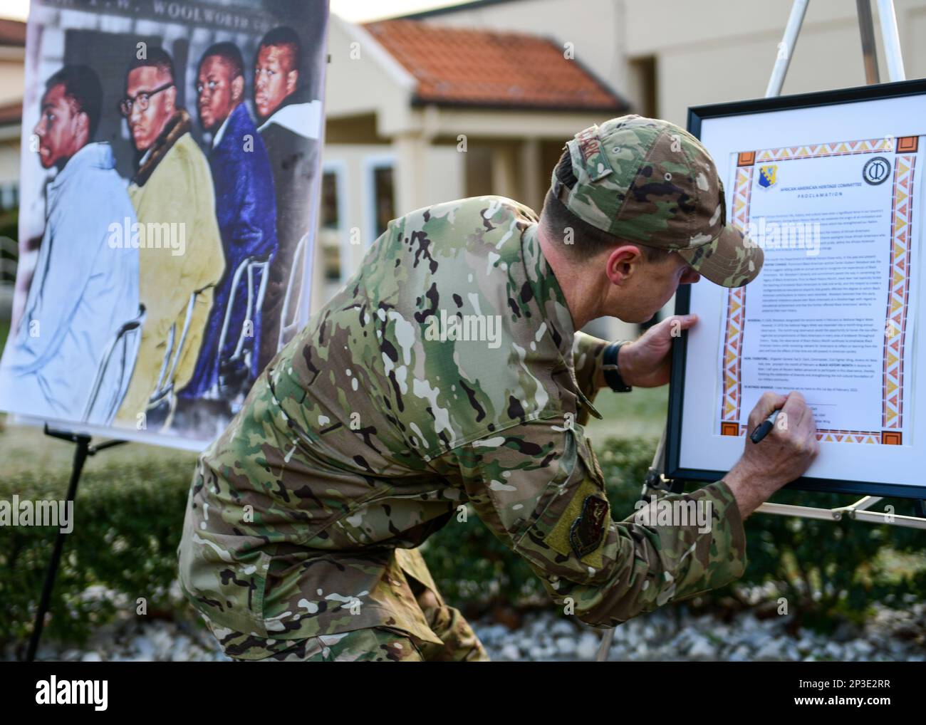 U.S. Air Force Brig. Gen. Tad Clark, 31st Fighter Wing commander, signs ...