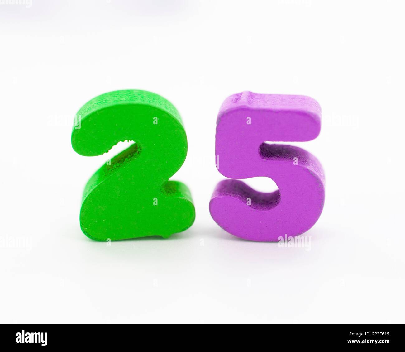 25 colorful wooden numbers decorative on the white Stock Photo - Alamy