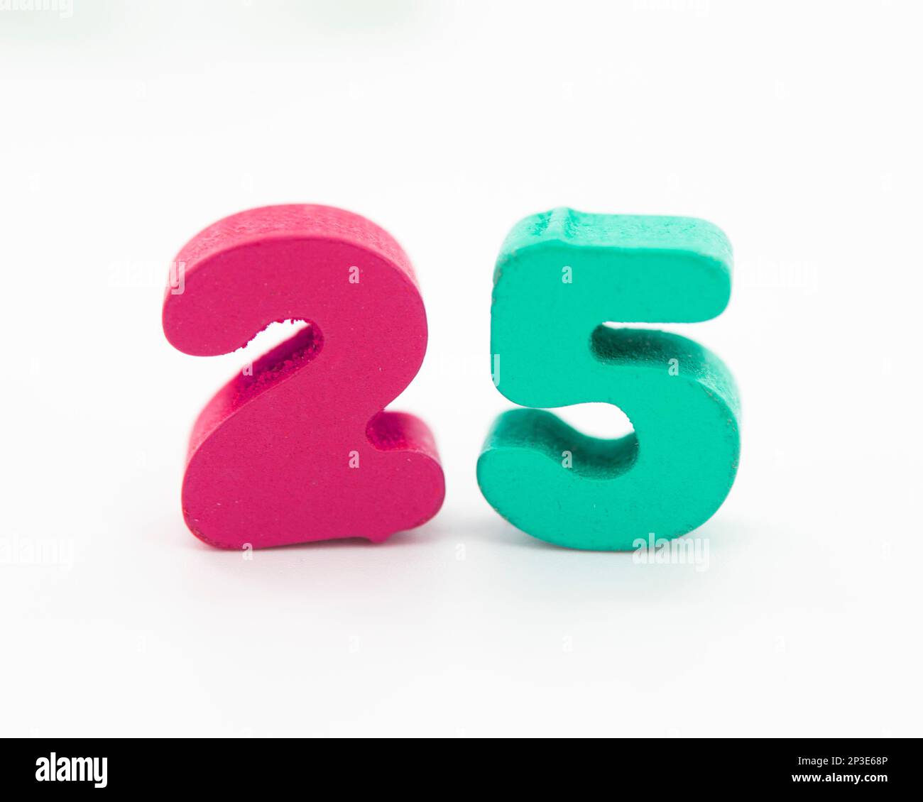 25 colorful wooden numbers decorative on the white Stock Photo - Alamy