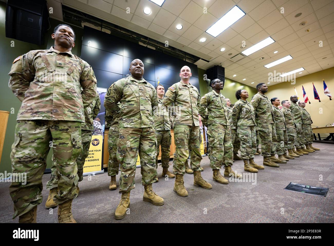Soldiers stand at-ease as they wait for Maj. Gen. Bob Harter ...