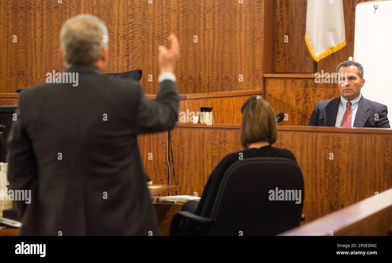 Prosecutor Patrick Bomberg, left, questions Sgt. Stephen Walsh, right ...