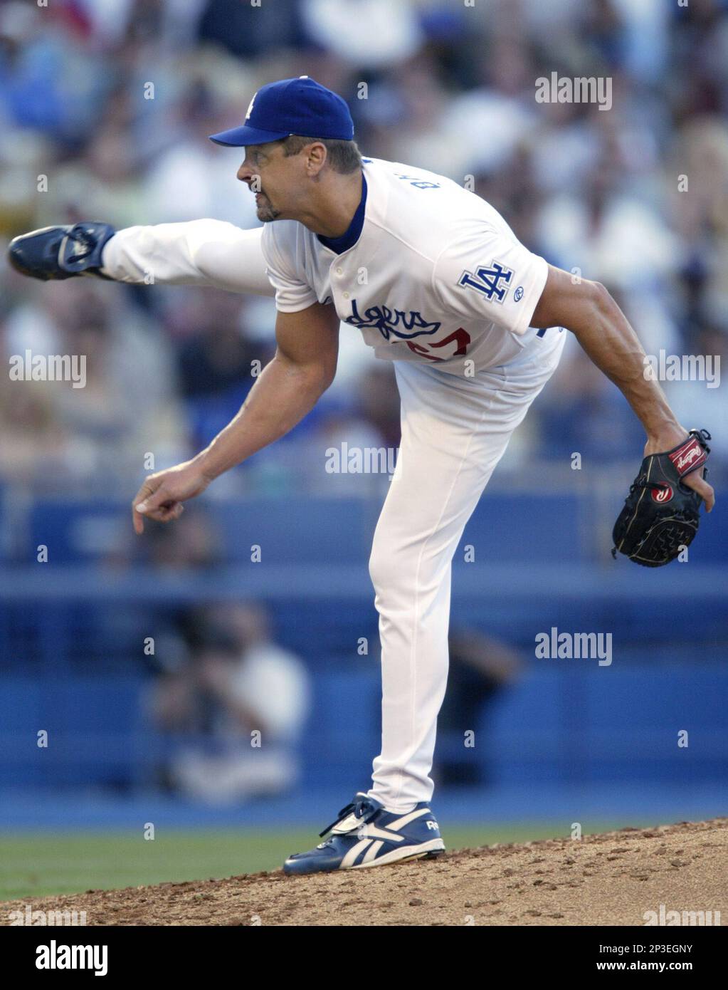 Kevin Brown of the Los Angeles Dodgers pitches during a 2002 MLB season ...