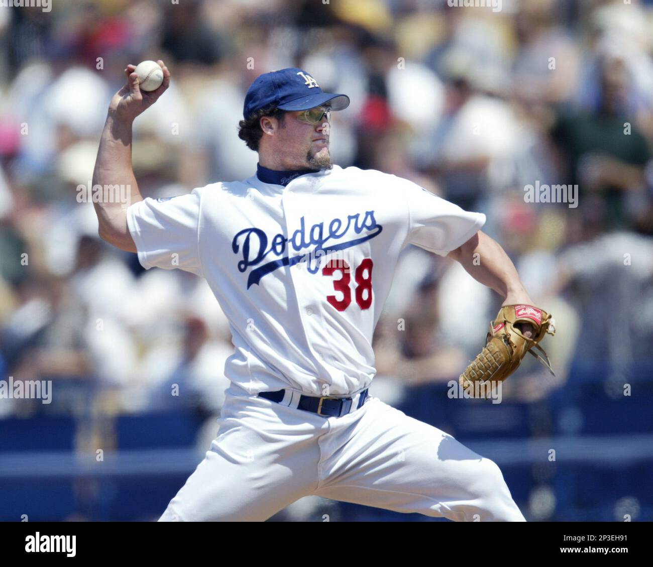 Eric Gange of the Los Angeles Dodgers pitches during a 2002 MLB season ...