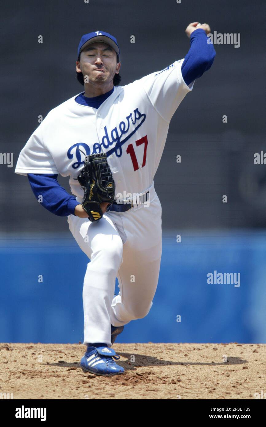 Kazuhisa Ishii of the Los Angeles Dodgers pitches during a 2002 MLB ...