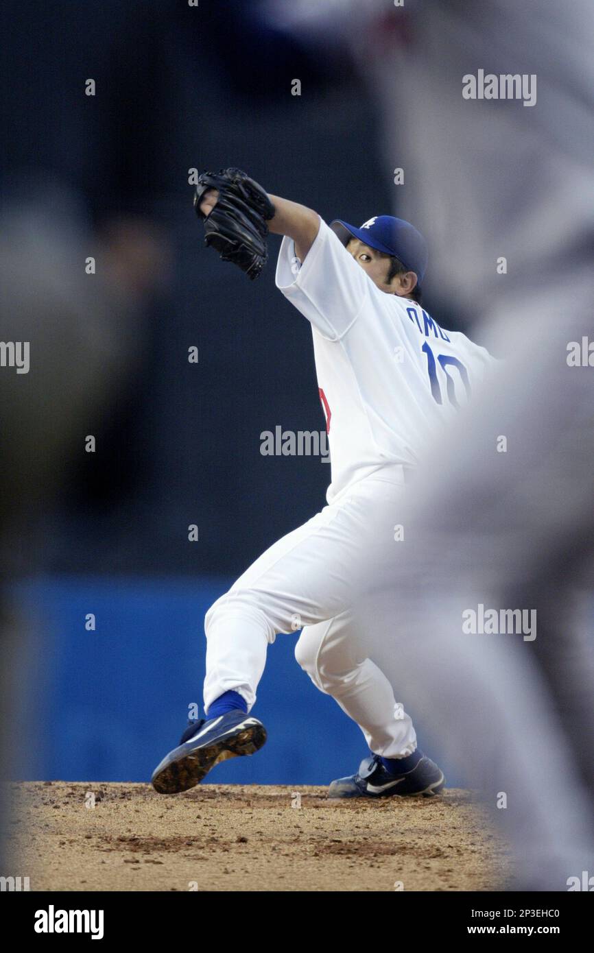 Hideo Nomo of the Los Angeles Dodgers pitches during a 2002 MLB season ...