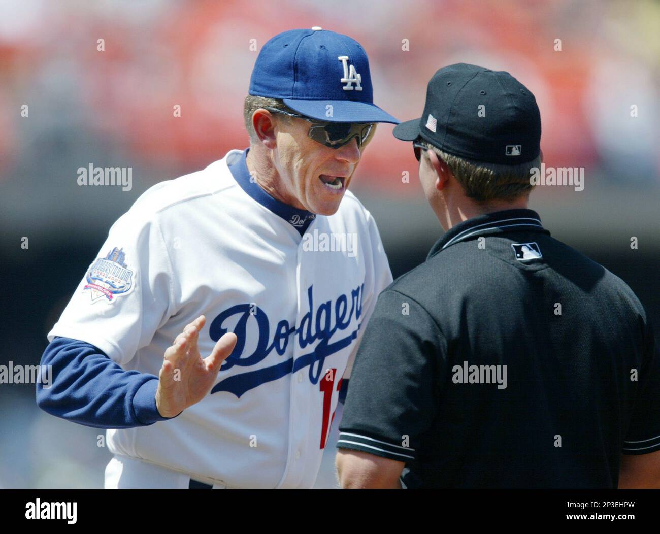 Los Angeles Dodgers Manager Jim Tracy argues with a umpire during a ...