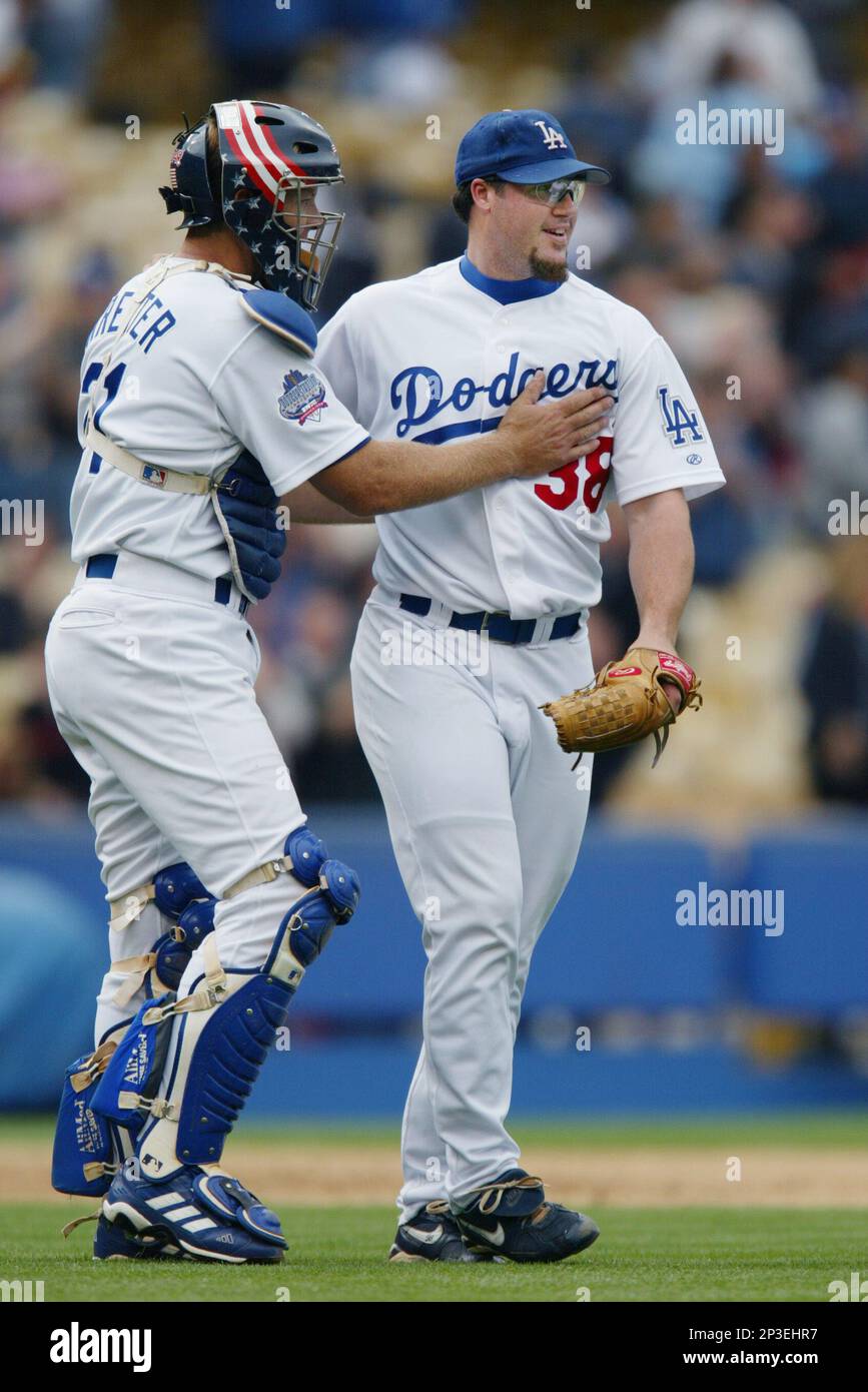 Chad Kreuter and Eric Gange of the Los Angeles Dodgers celebrate during ...