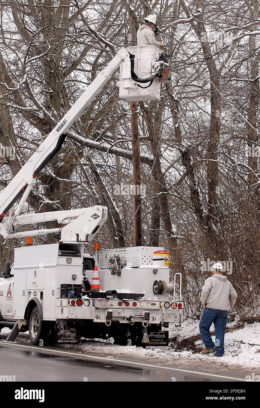 City of Alcoa electric workers repair downed power lines on Hunt Road ...
