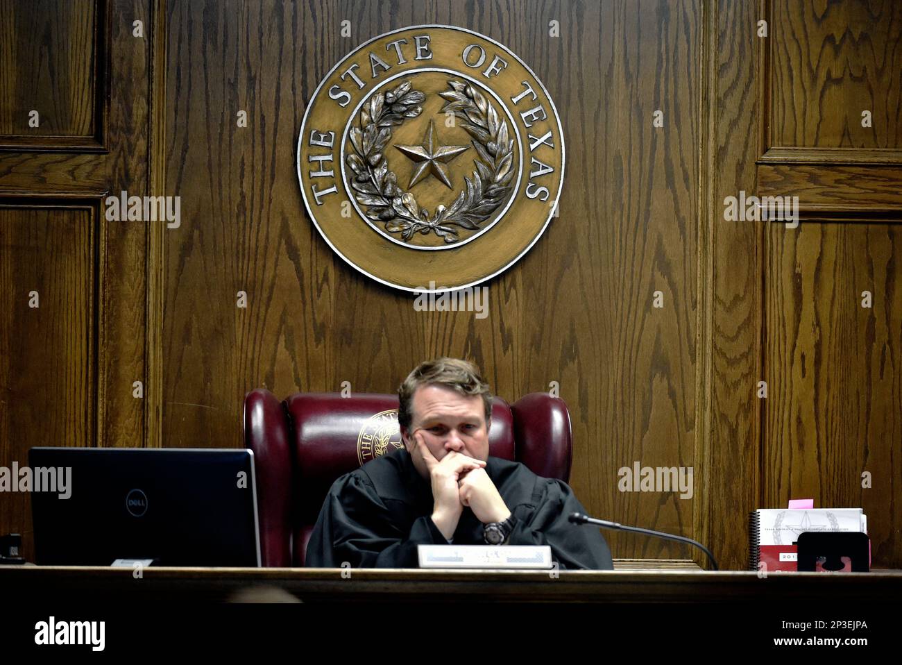 State District Judge Jason Cashon listens to testimony during the ...