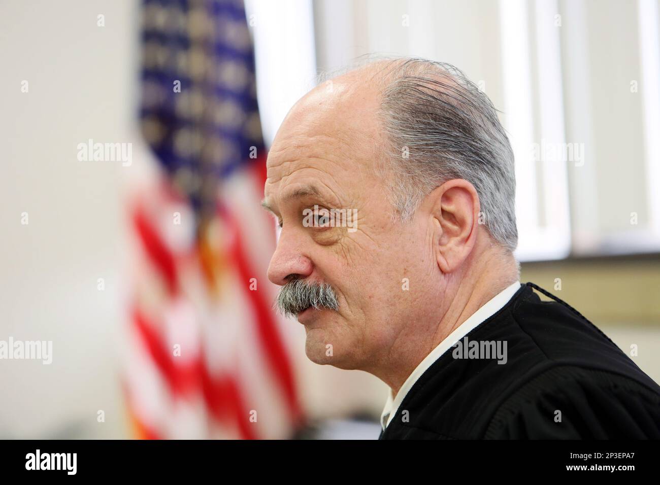 District Judge Joe McCarville issues his ruling in the preliminary ...
