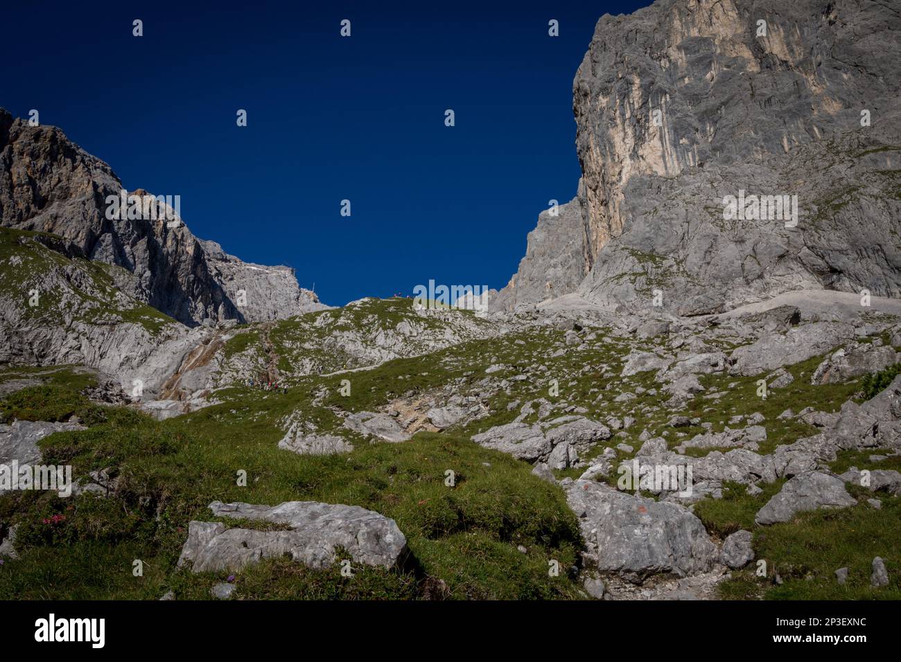 Mountain hiking trail with a view of the rocks. Zugspitze massif in the ...