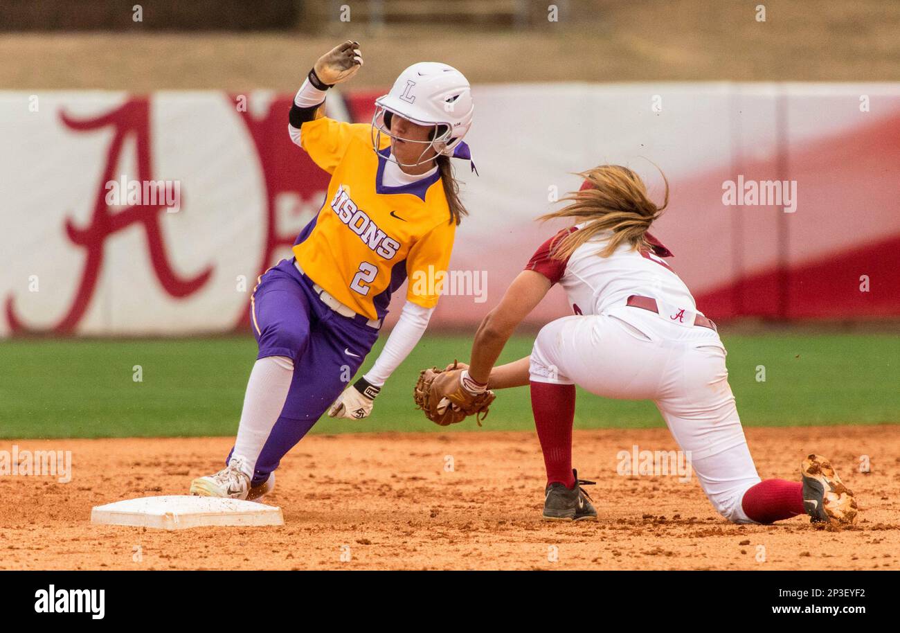 Lipscomb's Brittany Elmore, left, steals second past the tag of Alabama ...