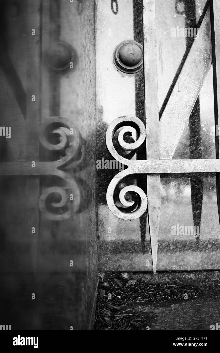 A decorative copper metal fence with fine craftsmanship in a black and ...