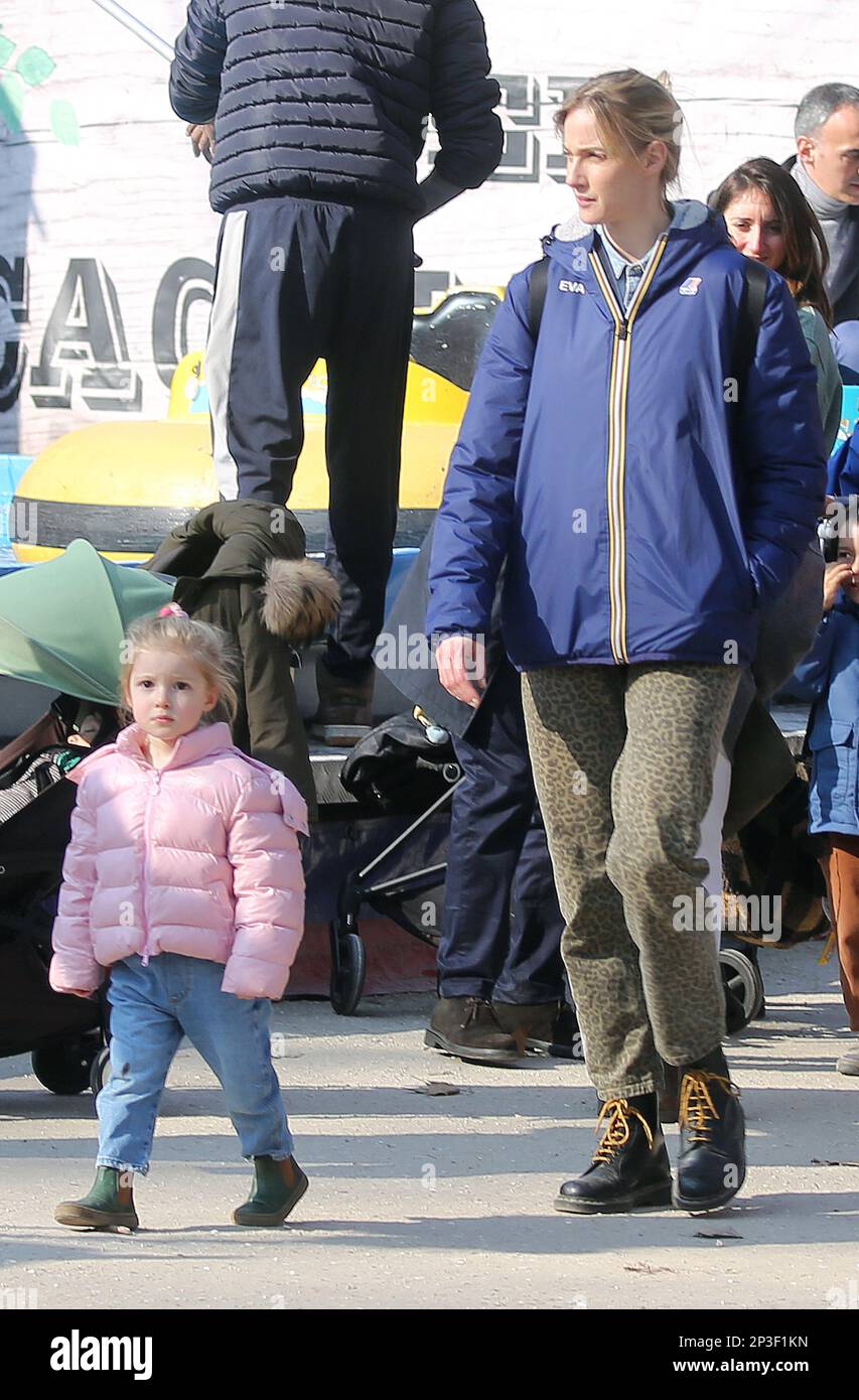 Eva Riccobono at the rides in Parco Sempione with her children Leo and ...