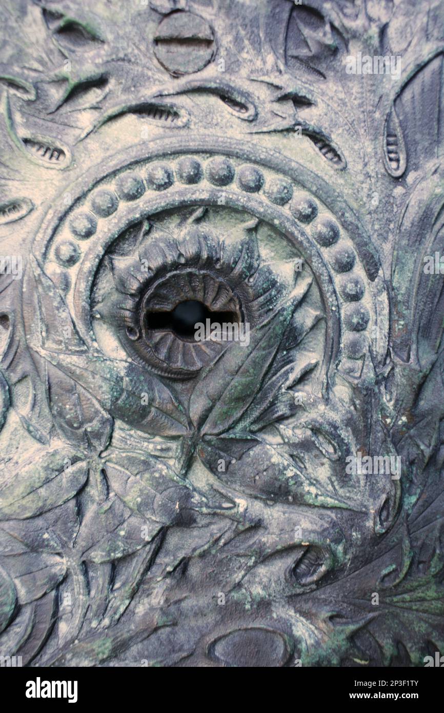 A medieval keyhole in the copper patina gate Stock Photo - Alamy