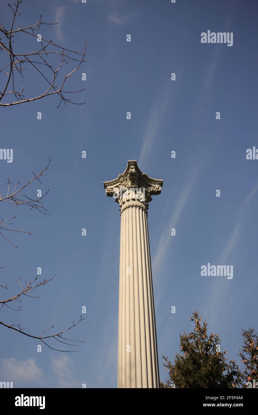 Single Greek column soaring towards the clear blue sky Stock Photo - Alamy