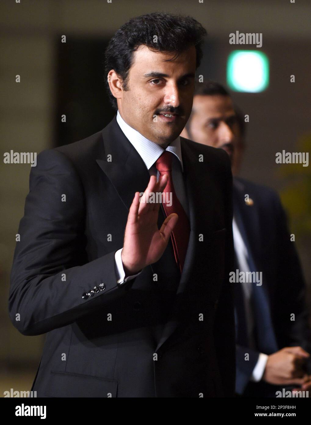 Qatar's Emir Sheikh Tamim bin Hamad Al Thani arrives for the talk with ...