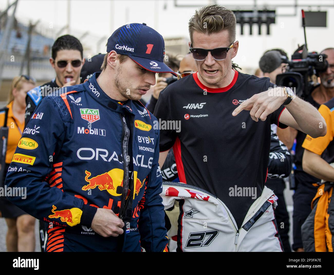 BAHRAIN - Max Verstappen (Red Bull Racing) and Nico Hulkenberg (Haas F1 Team) in conversation ...