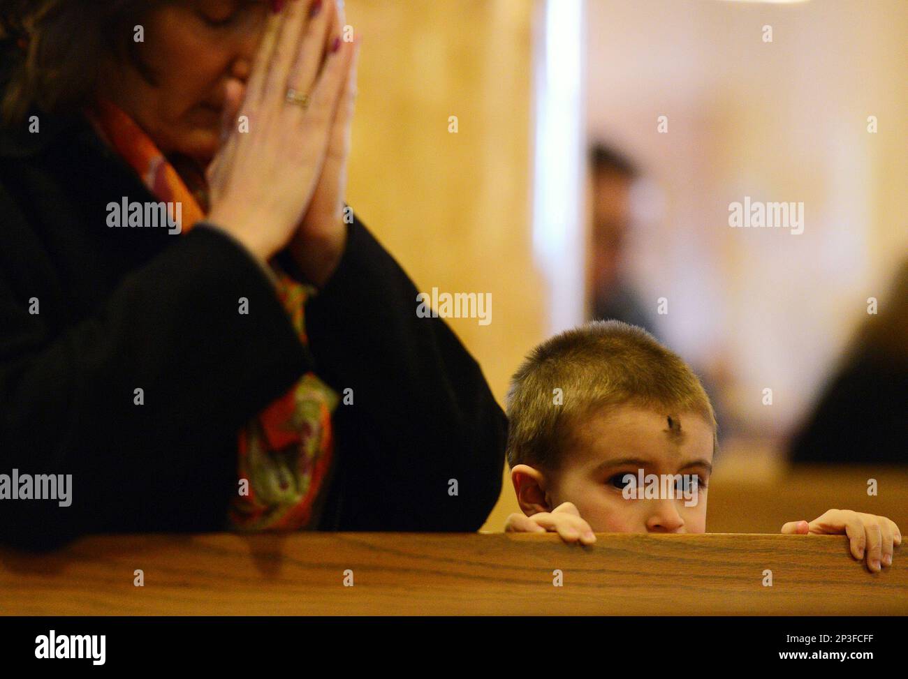 Michelle Commisso and her grandson Christian Vella, 5, attend an Ash ...