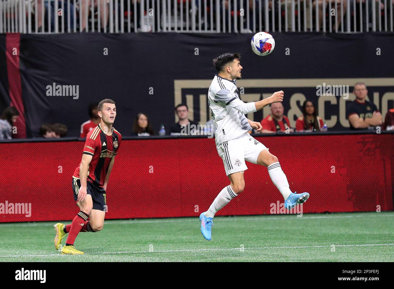 ATLANTA, GA - MARCH 04: Toronto FC defender Raoul Petretta (28) heads ...