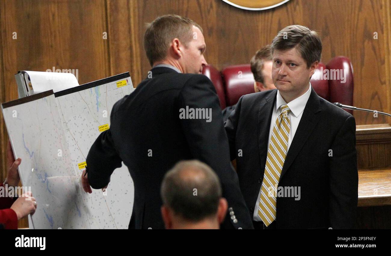 Texas Ranger Danny Briley, left, talks about important locations in the ...