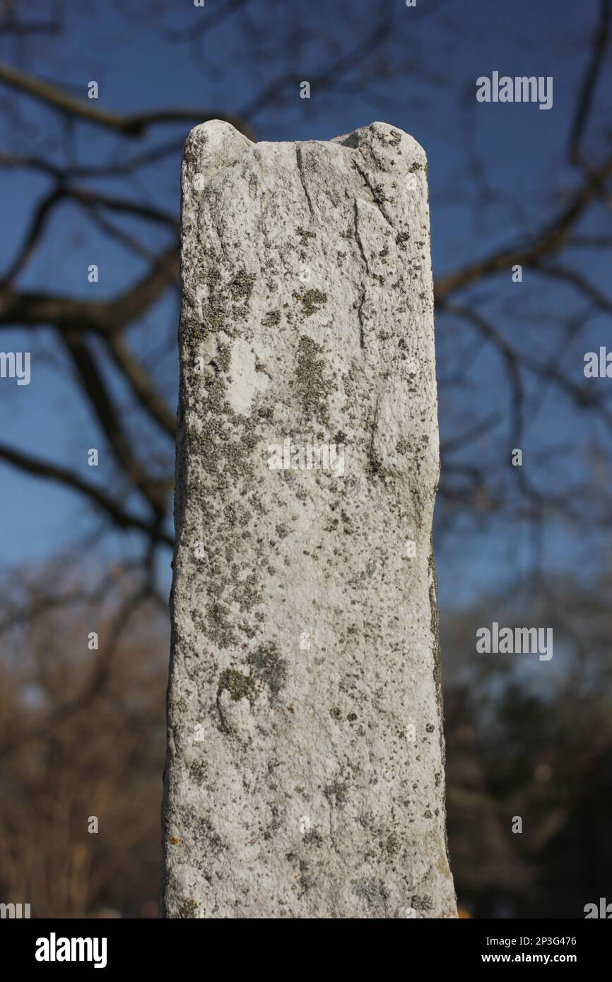 A worn and weathered simple stone tower Stock Photo - Alamy