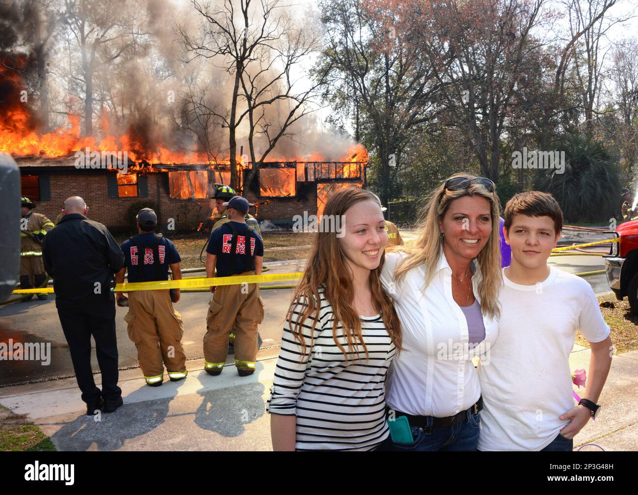 Diena Thompson, mother of Somer Thompson, center, stands with her ...