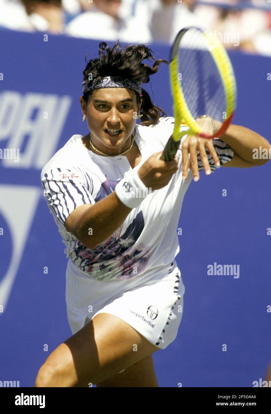Gabriella Sabatini chases a forehand at the U. S. Open, September 1994 ...