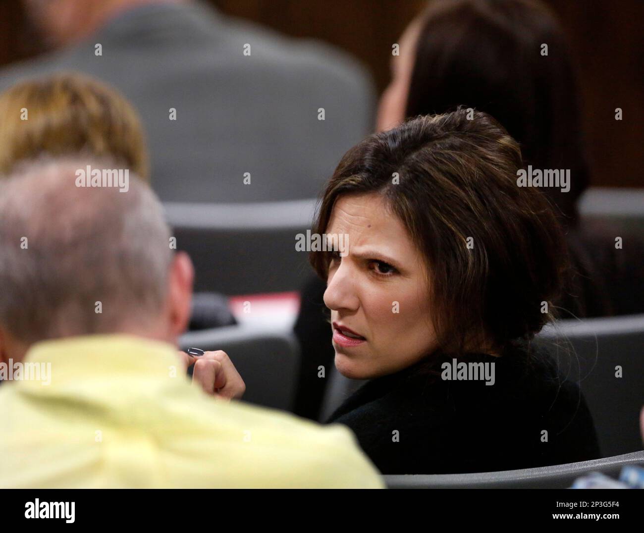 Taya Kyle, wife of former Navy SEAL Chris Kyle, looks back in court as ...