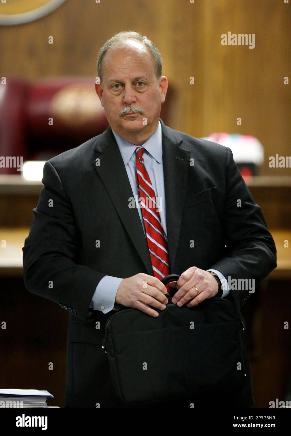 Court appointed defense attorney J. Warren St. John arrives in court ...