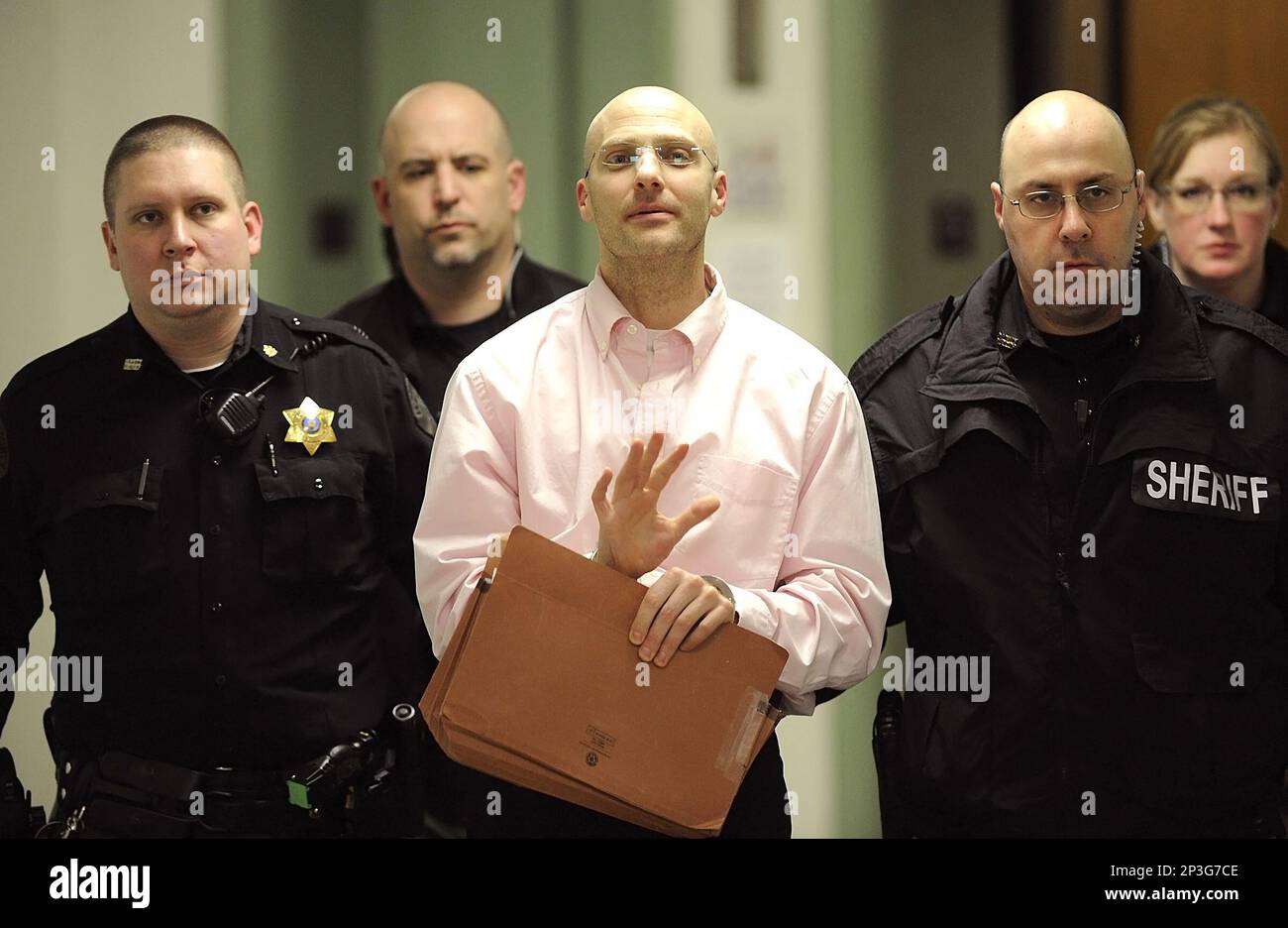 Hugo Selenski, center, is led from the Luzerne County Courthouse in ...