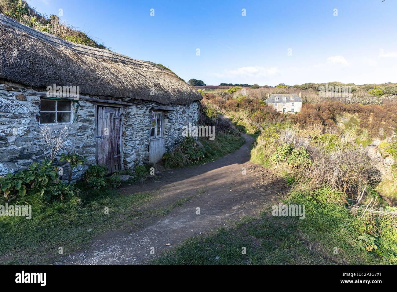 Derelict fishermen's' stores and cottages at the top of Bessy Cove ...