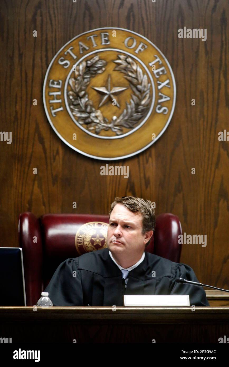 District Judge Jason Cashon listens to testimony by Taya Kyle, wife of ...