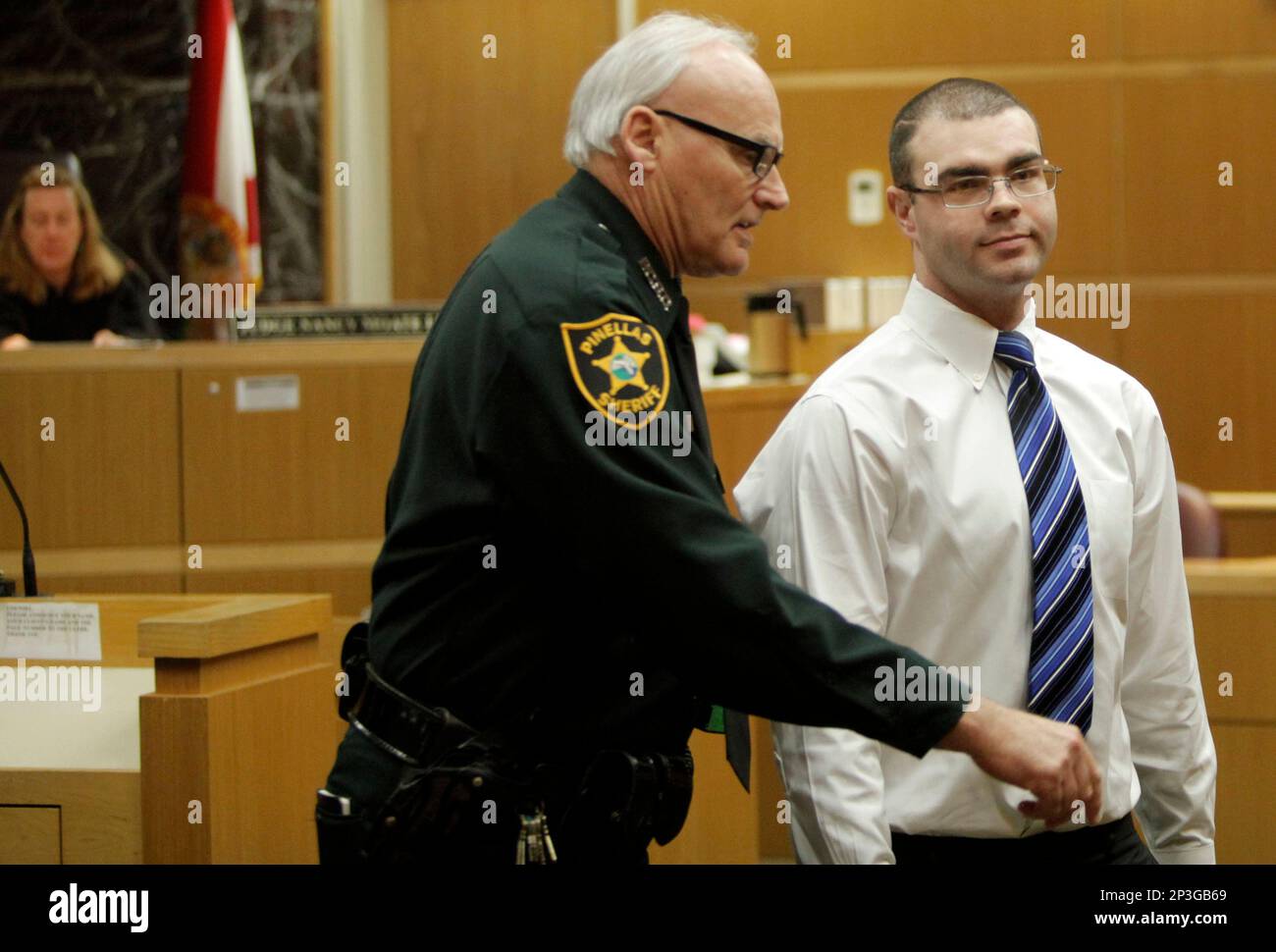 Kevin Kyne, right, leaves the courtroom after being declared not guilty ...