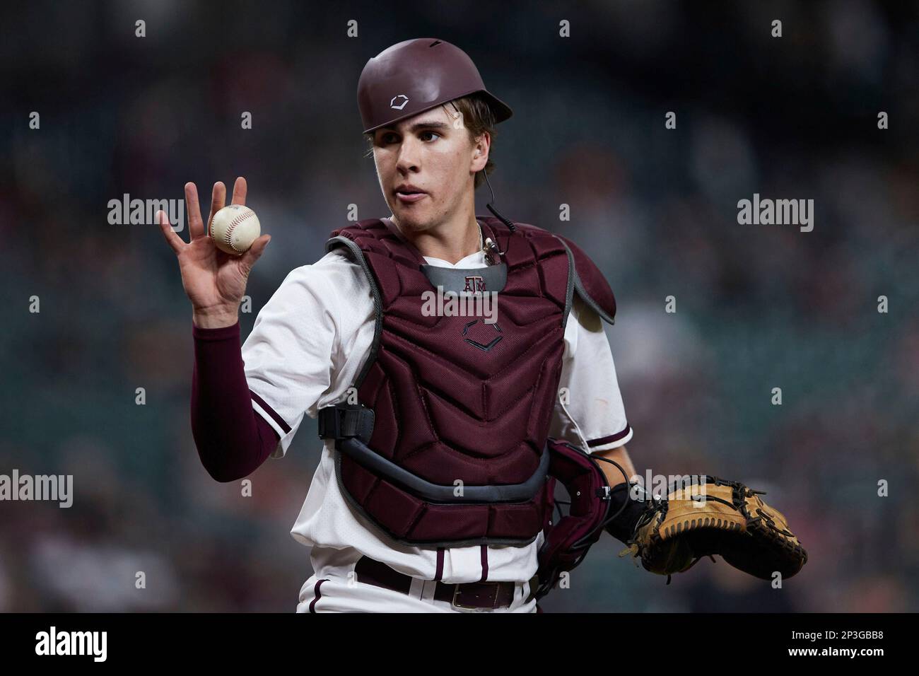 Texas A&M Aggies catcher Hank Bard (48) on defense against the Rice ...