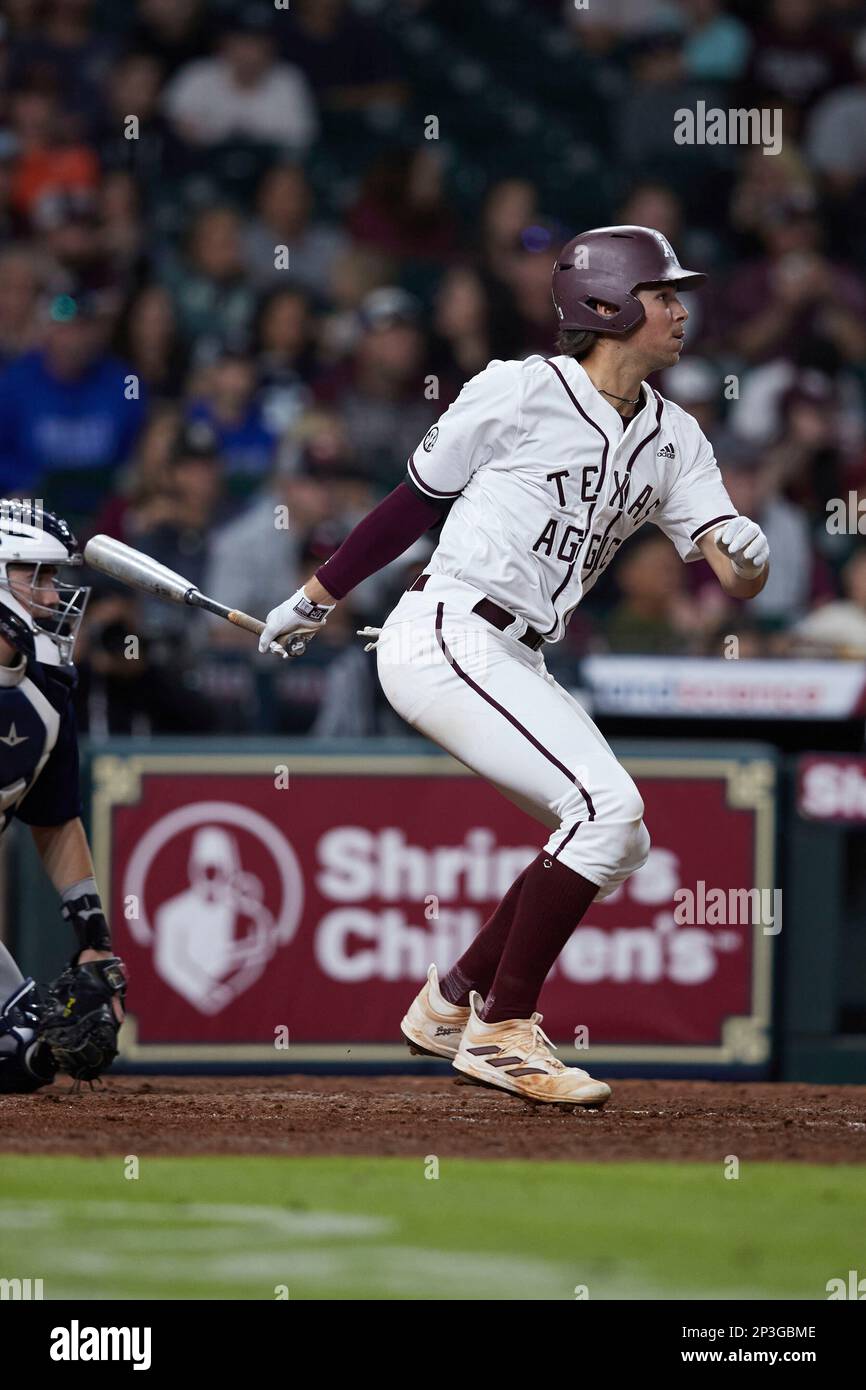 Kaeden Kent (3) of the Texas A&M Aggies follows through on his swing ...