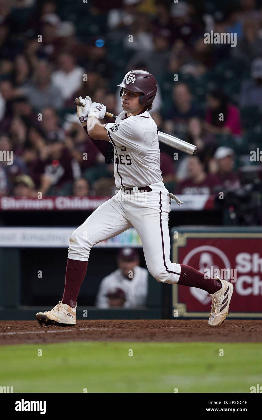 Kaeden Kent (3) of the Texas A&M Aggies follows through on his swing ...