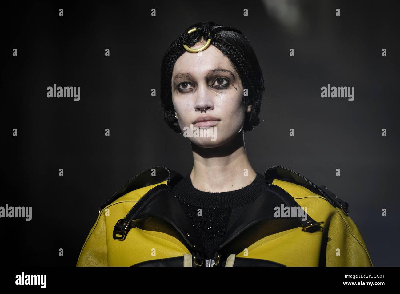 A model wears a creation as part of the Junya Watanabe Fall/Winter 2023 ...