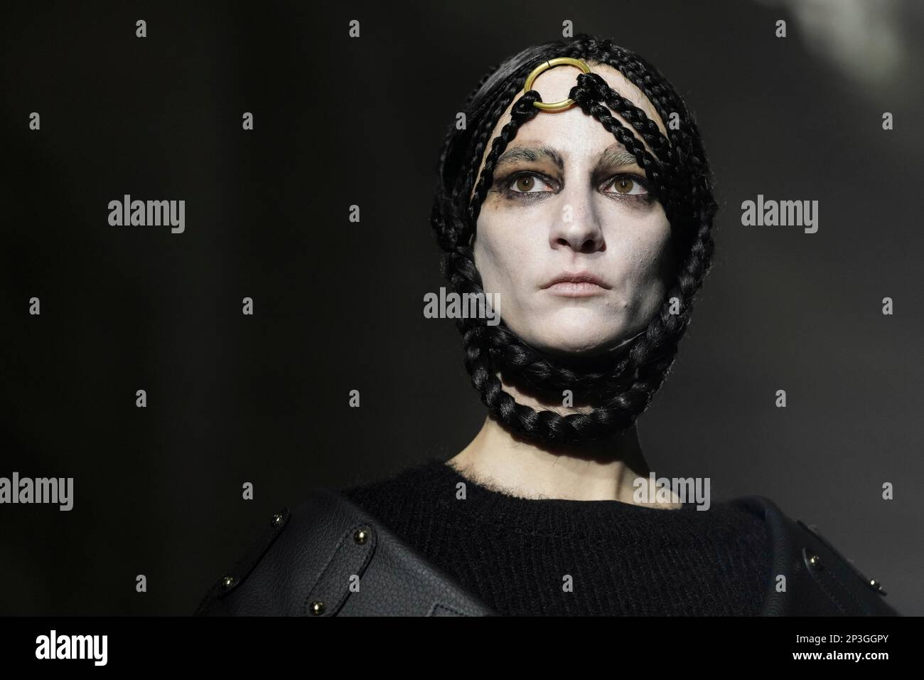 A model wears a creation as part of the Junya Watanabe Fall/Winter 2023 ...