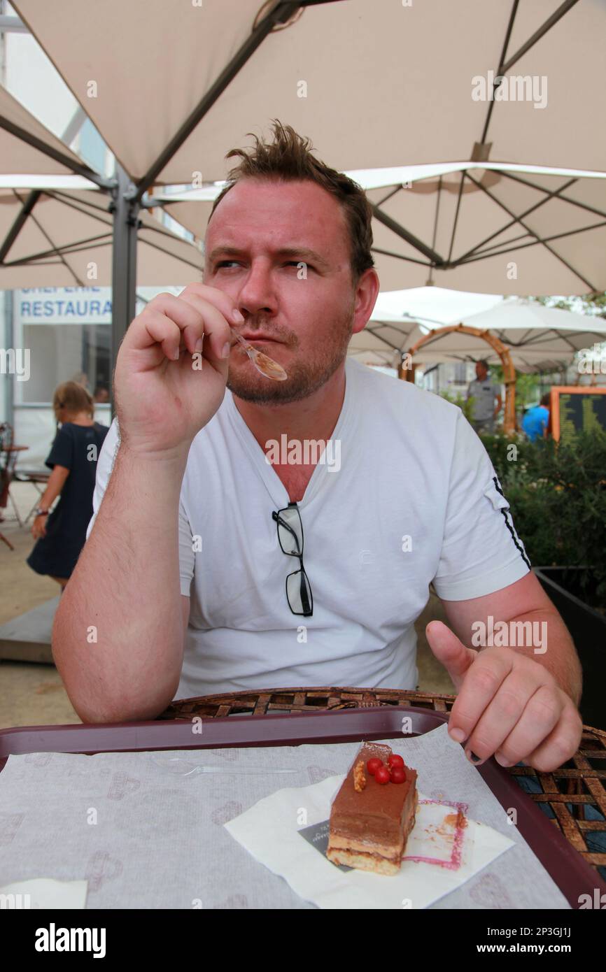 Pudding custard eating man hi-res stock photography and images - Alamy