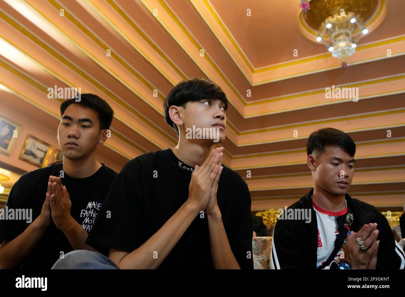 From left, Natthawut Thakhamsong, Prachak Sutham, and soccer coach Ekkapol Chanthawong, members ...