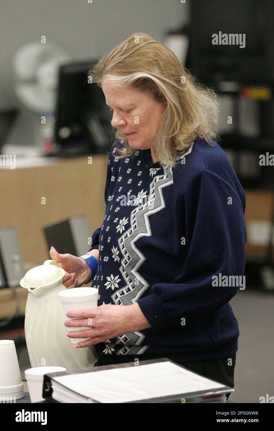 Defendant Theresa Supino pours water during her murder trial, Friday ...