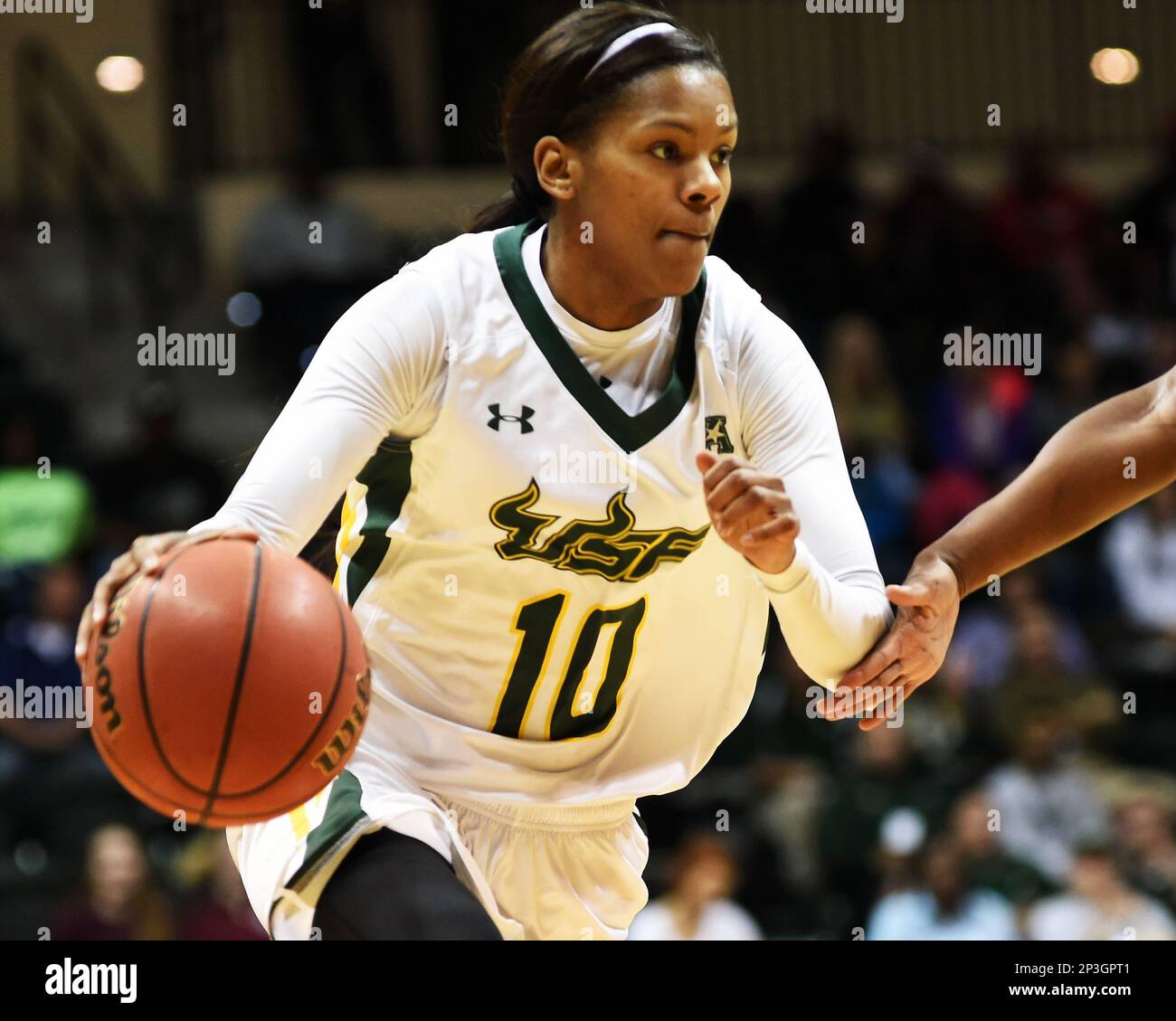 Guard Courtney Williams (10) of South Florida drives up court against ...