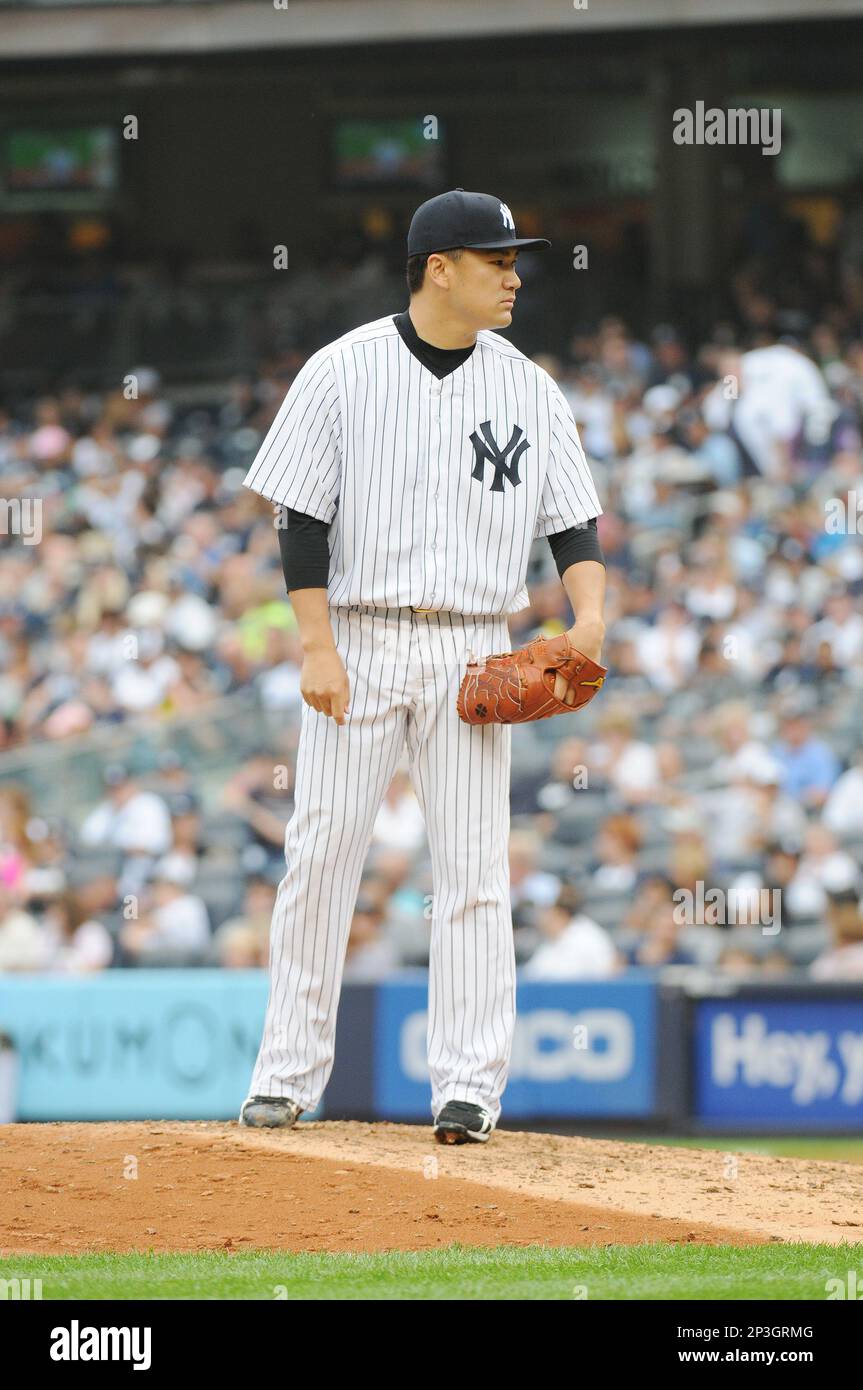 New York Yankees pitcher Masahiro Tanaka (19) during game against the Toronto Blue Jays at ...