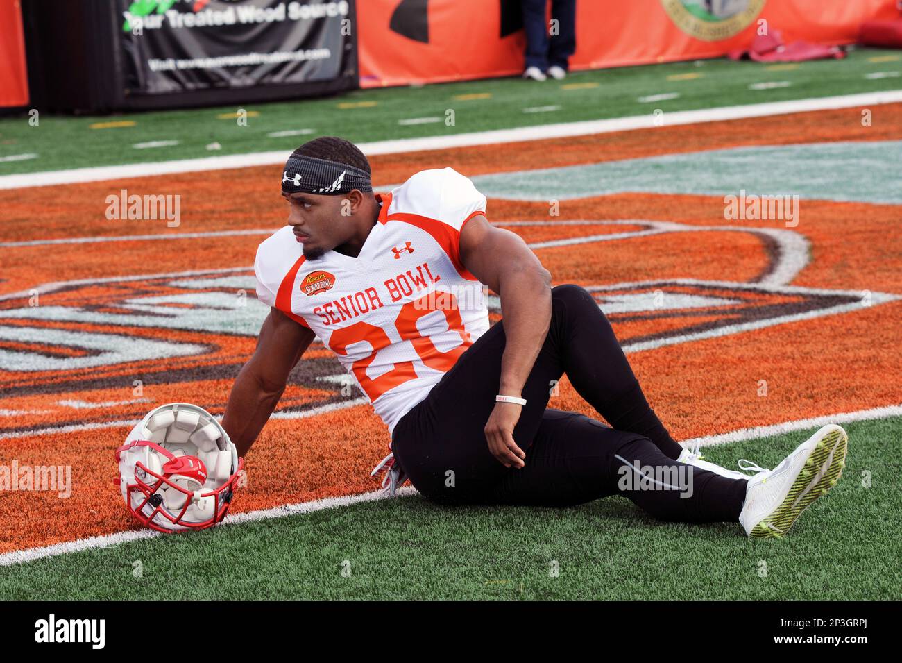 Running back Ameer Abdullah (28) of Nebraska stretches before a north ...