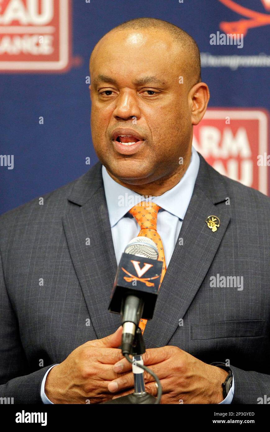 University of Virginia head coach Mike London talks with the media ...