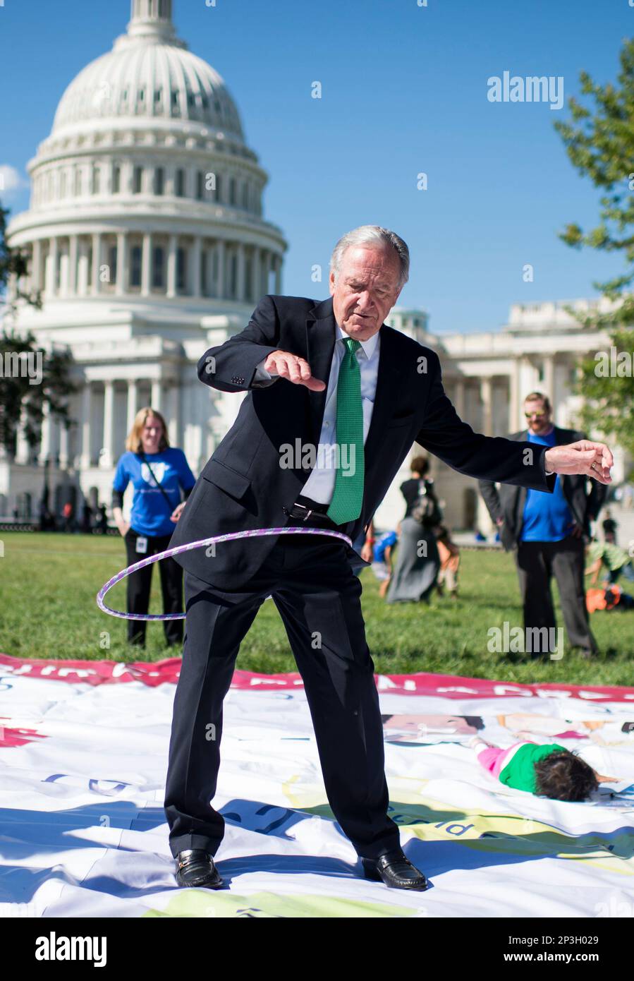 UNITED STATES - SEPTEMBER 18: Sen. Tom Harkin, D-Iowa, hula hoops on ...