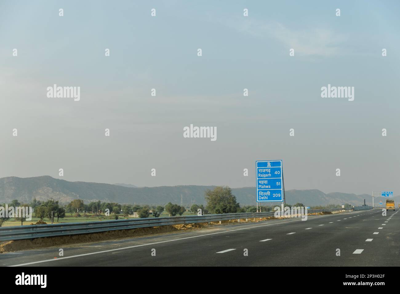 Some traffic signs along the Delhi-Mumbai Expressway in India on a ...