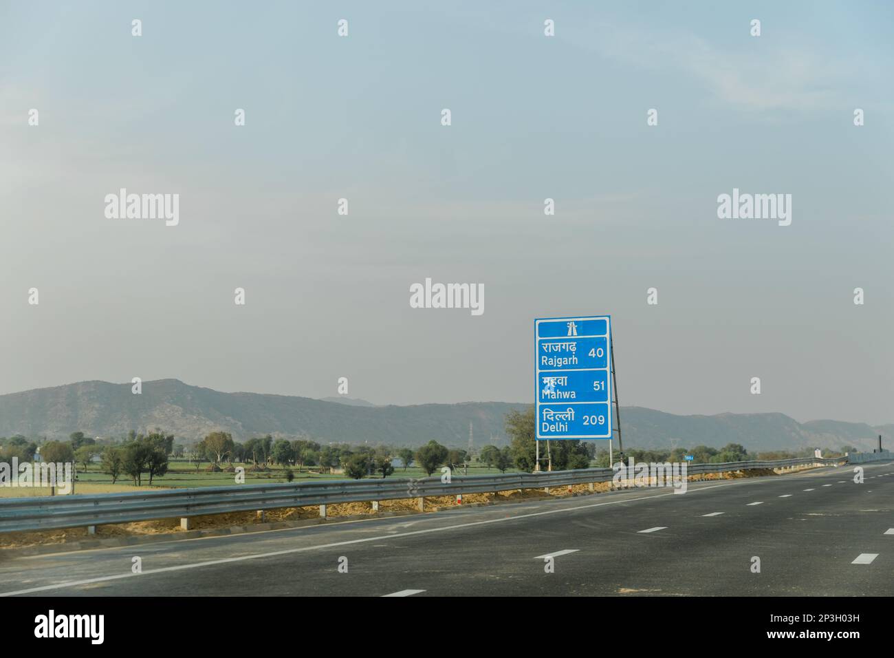 Some traffic signs along the Delhi-Mumbai Expressway in India on a ...