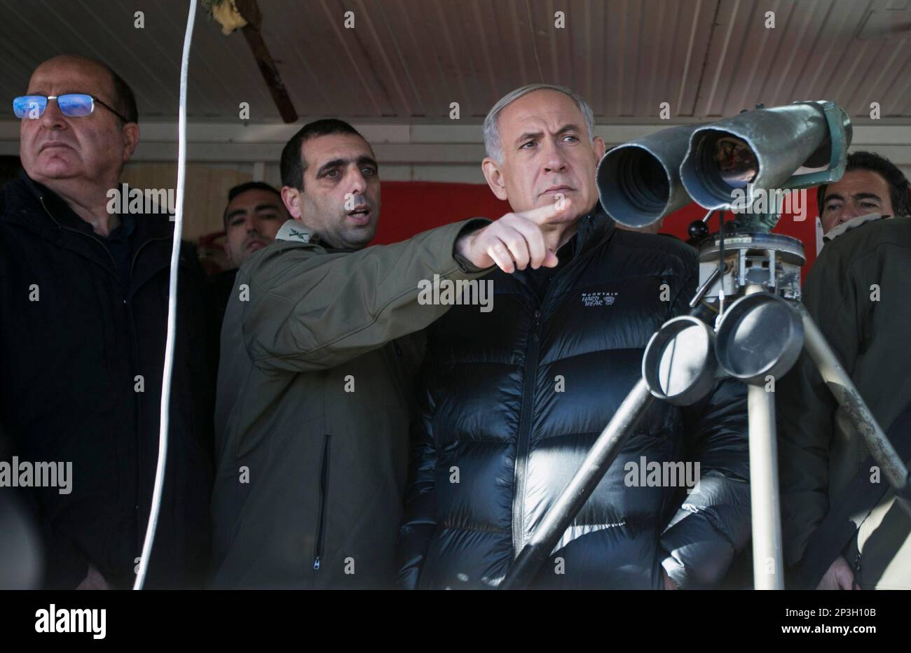 Israel's Prime Minister Benjamin Netanyahu, center, and Defense ...